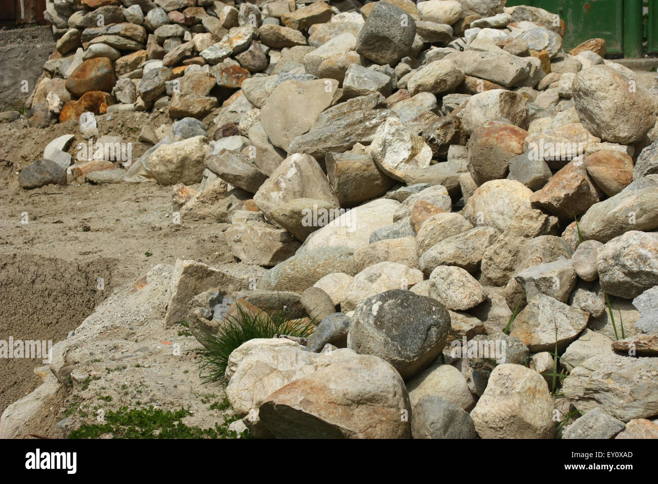 Pile of rocks recovered from an old building that will be used for ...