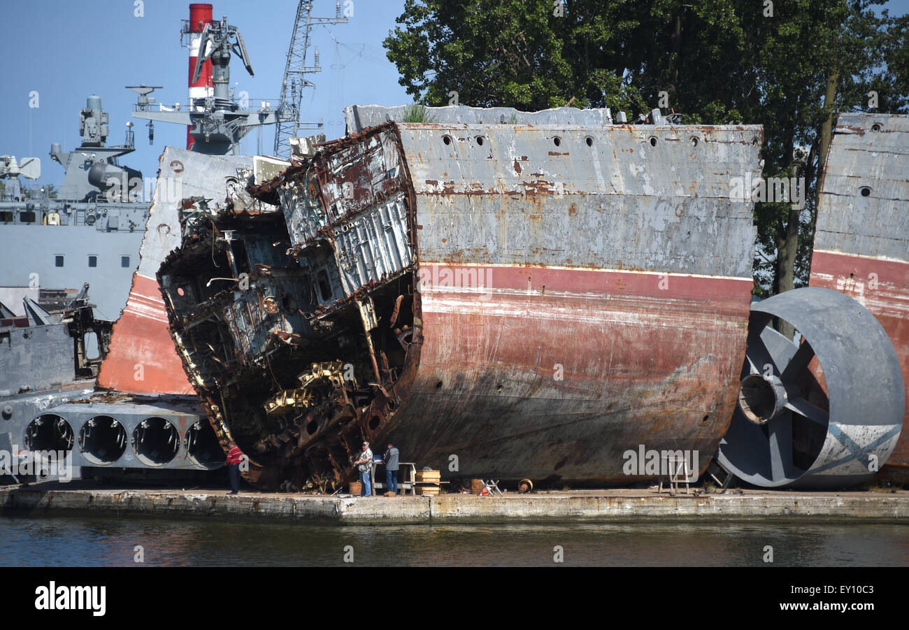 Kaliningrad, Russia. 19th July, 2015. Men fishing at the naval base in ...