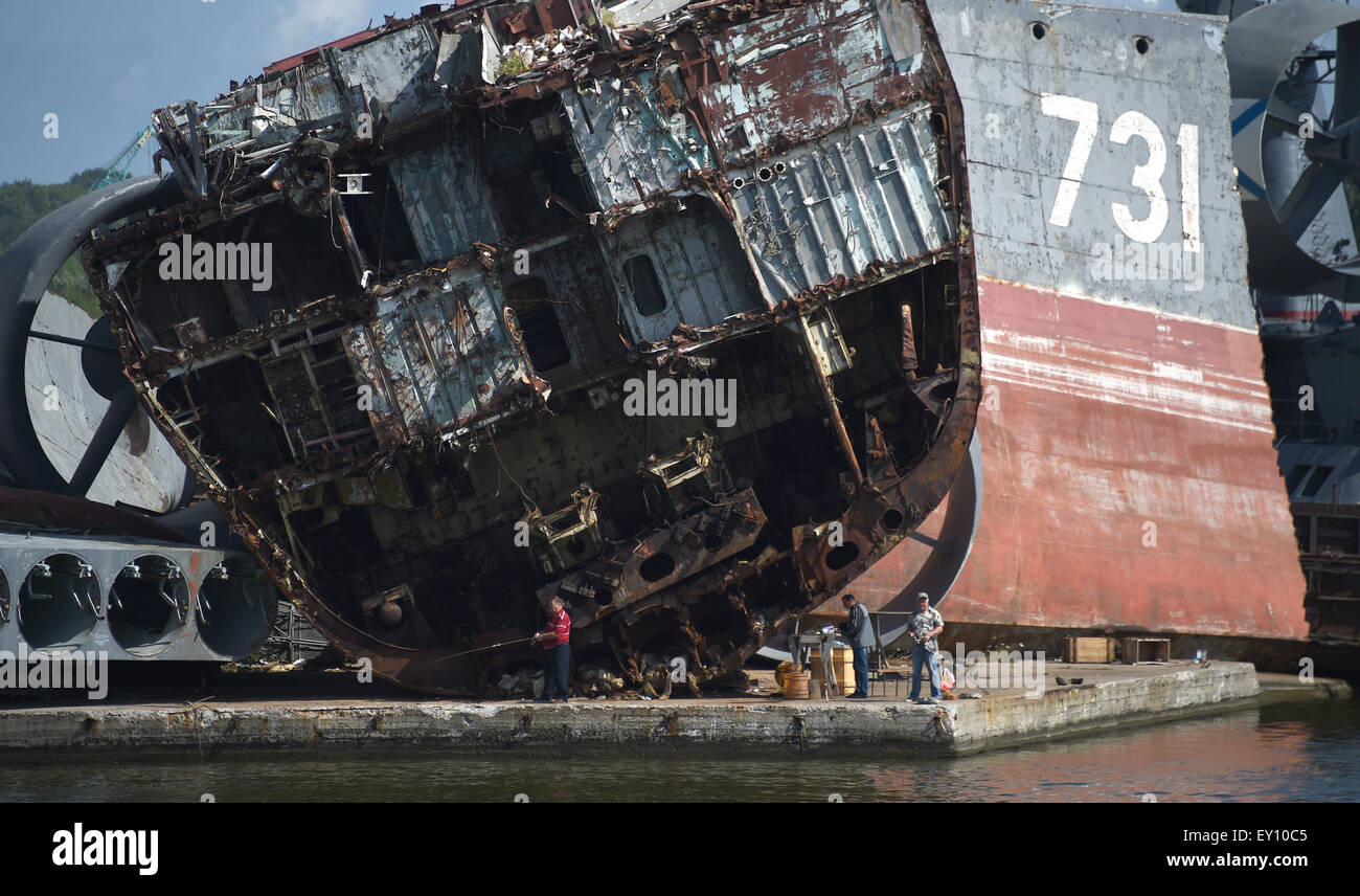 Kaliningrad, Russia. 19th July, 2015. Men fishing at the naval base in ...