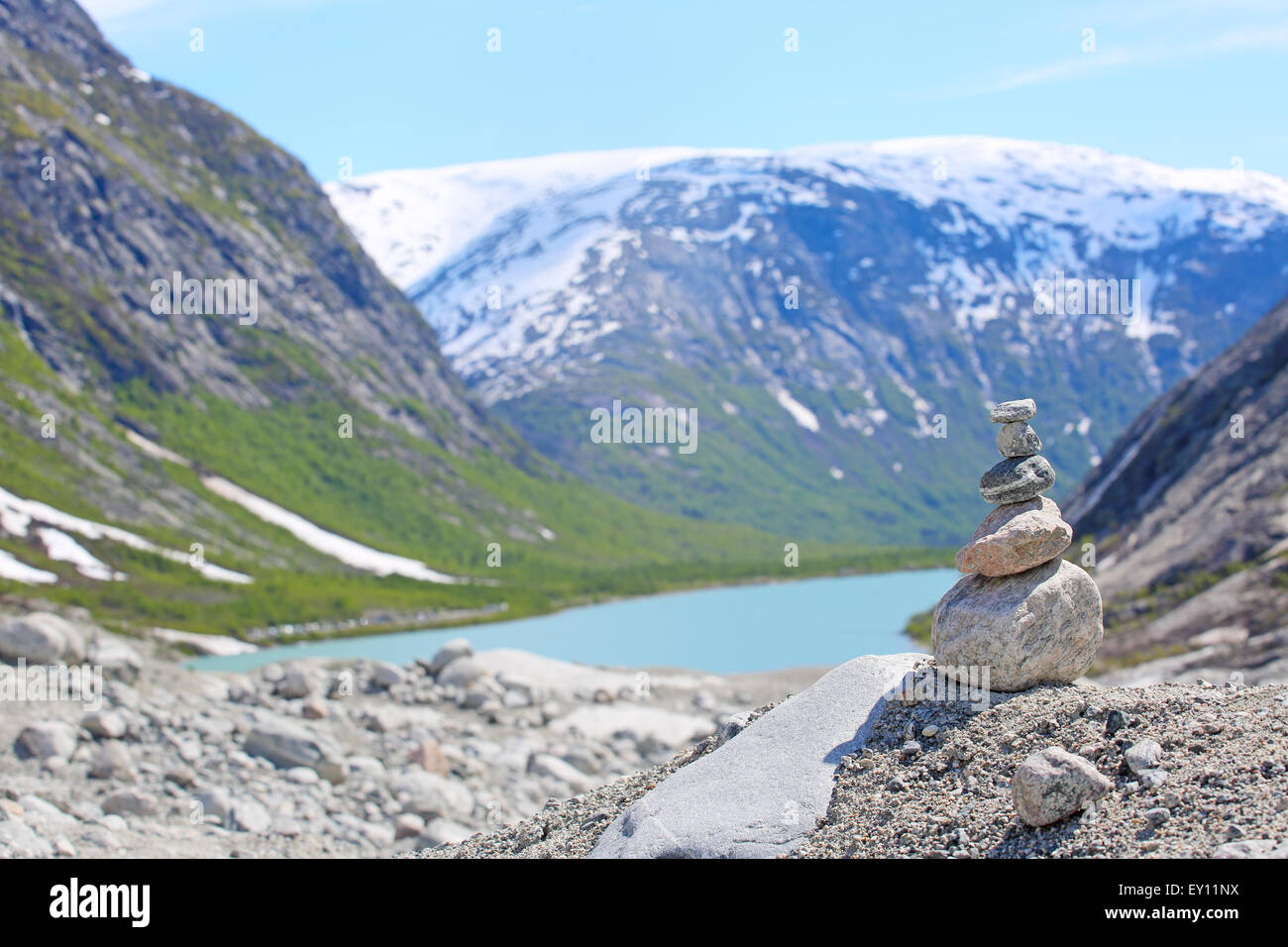 Stack of rocks with mountain and fjord view in Jostedalsbreen National ...