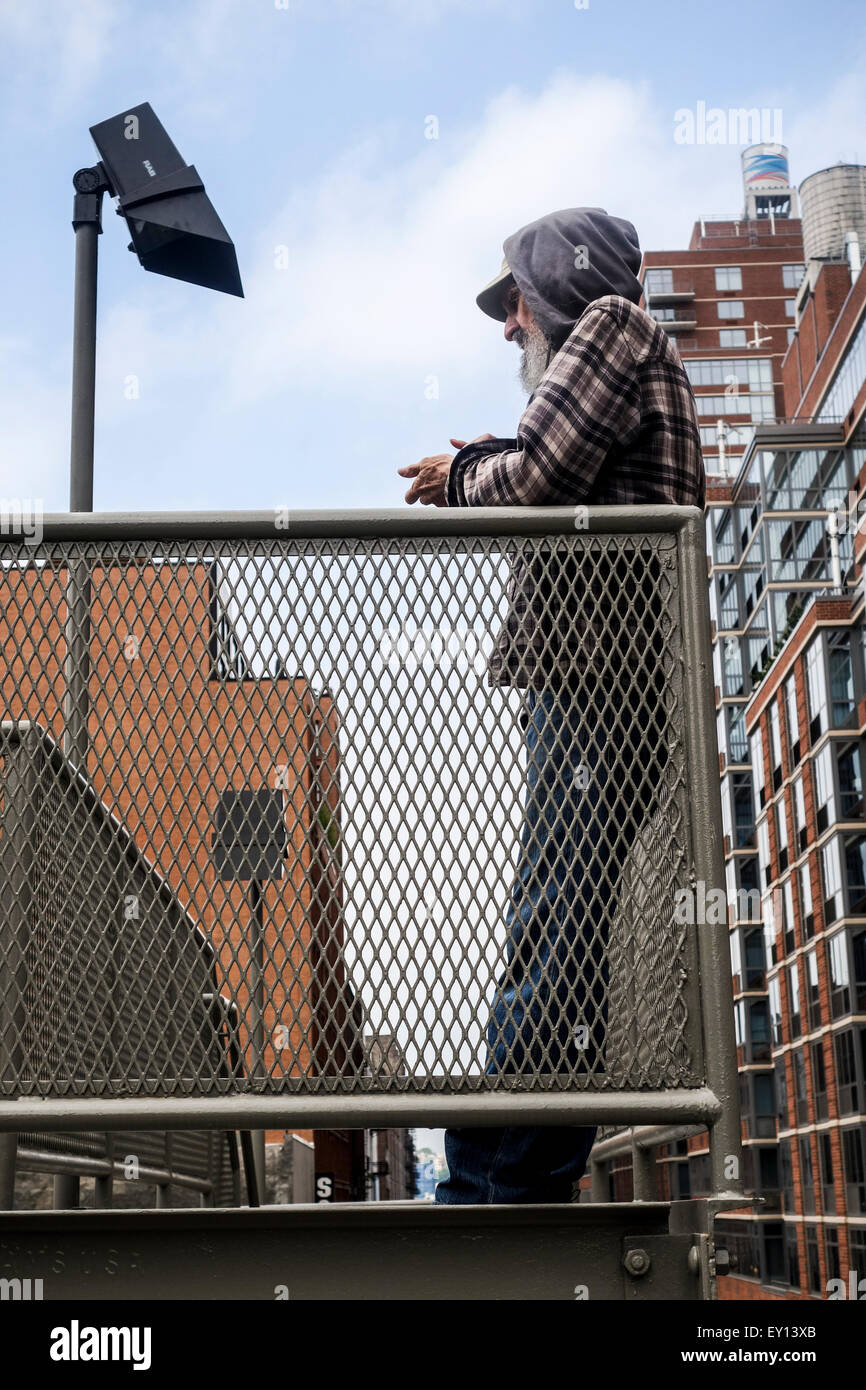 Senior Homeless man standing on staircase at High line, New york city ...