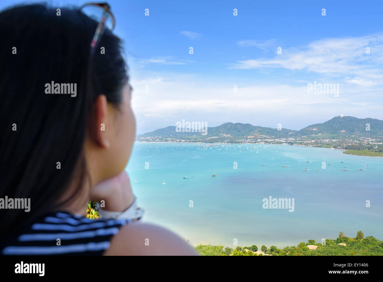 Back side the women tourist looking at beautiful landscape of sea and ...