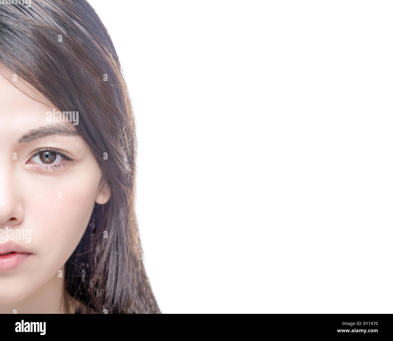 Half of Chinese Asian female face isolated on white background Stock ...