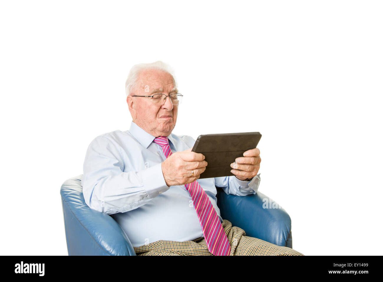 Senior using a tablet computer Stock Photo - Alamy