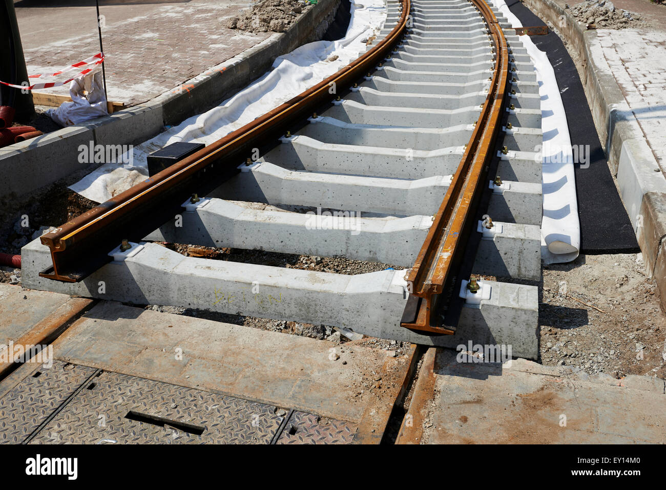 Construction of a tram railroad track in a city Stock Photo - Alamy
