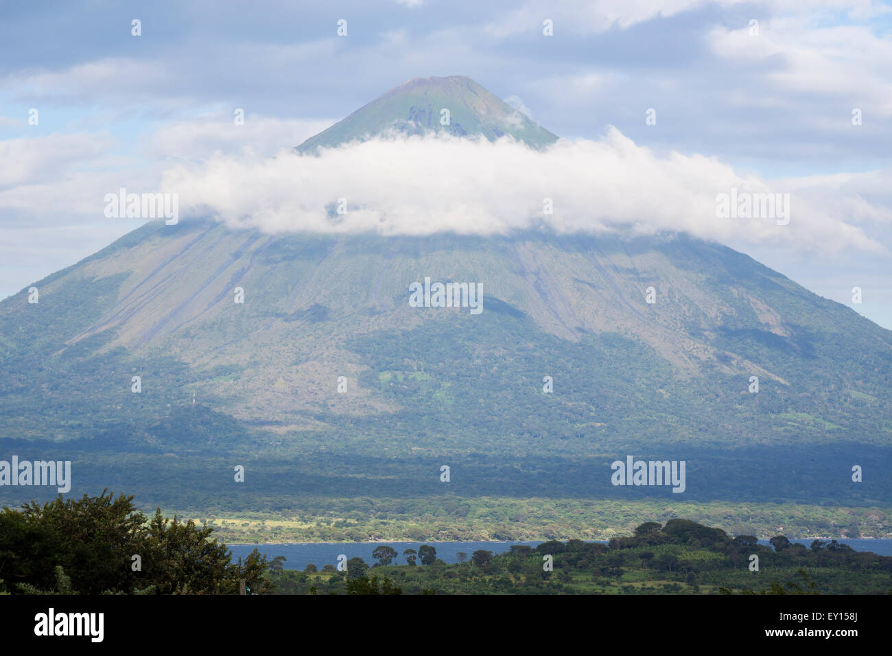 Ring of clouds around the top of Concepción volcano in Ometepe Island ...