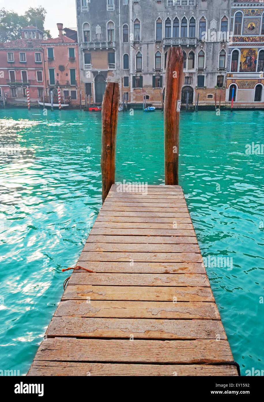 wooden pier in Venice Grand Canal, Italy Stock Photo - Alamy