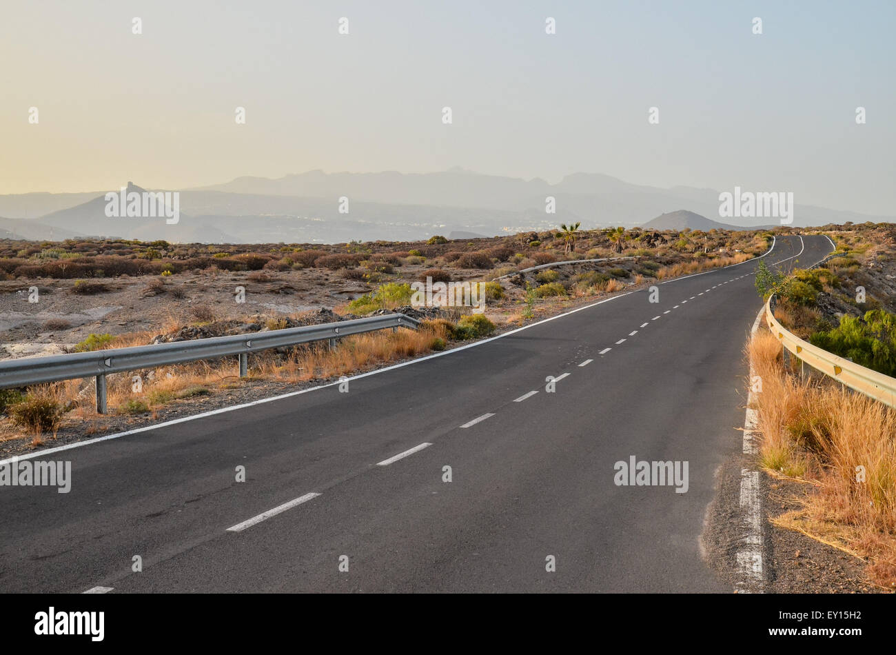 Long Lonely Road Stock Photo - Alamy