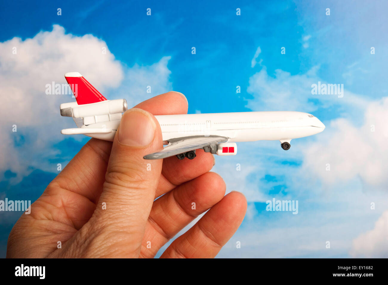 Hand holding plane hi-res stock photography and images - Alamy