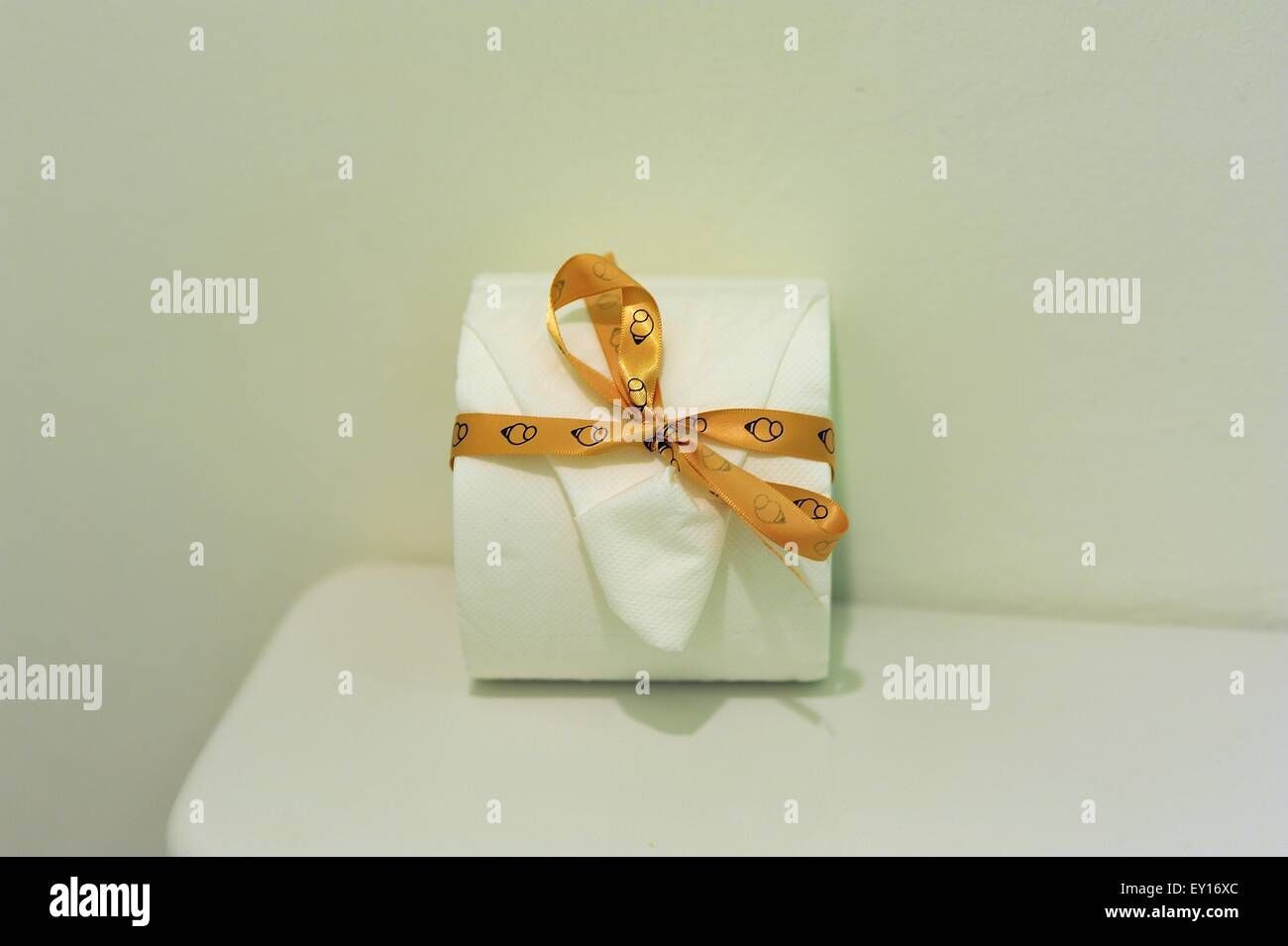 Ribbon around the Toilet Roll Stock Photo - Alamy