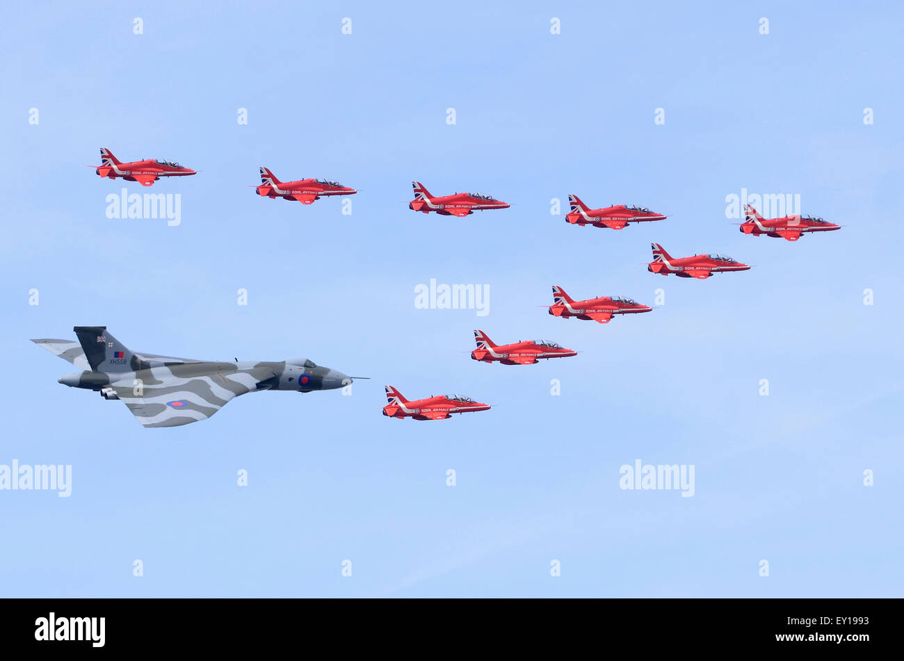 Red Arrows RAF BAe hawk aircraft in formation with Avro Vulcan B2 bomber XH558 at RIAT 2015 ...