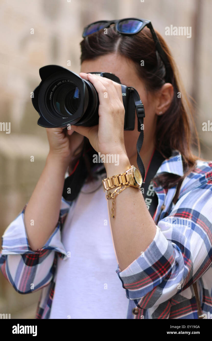Lady taking photographs Stock Photo - Alamy