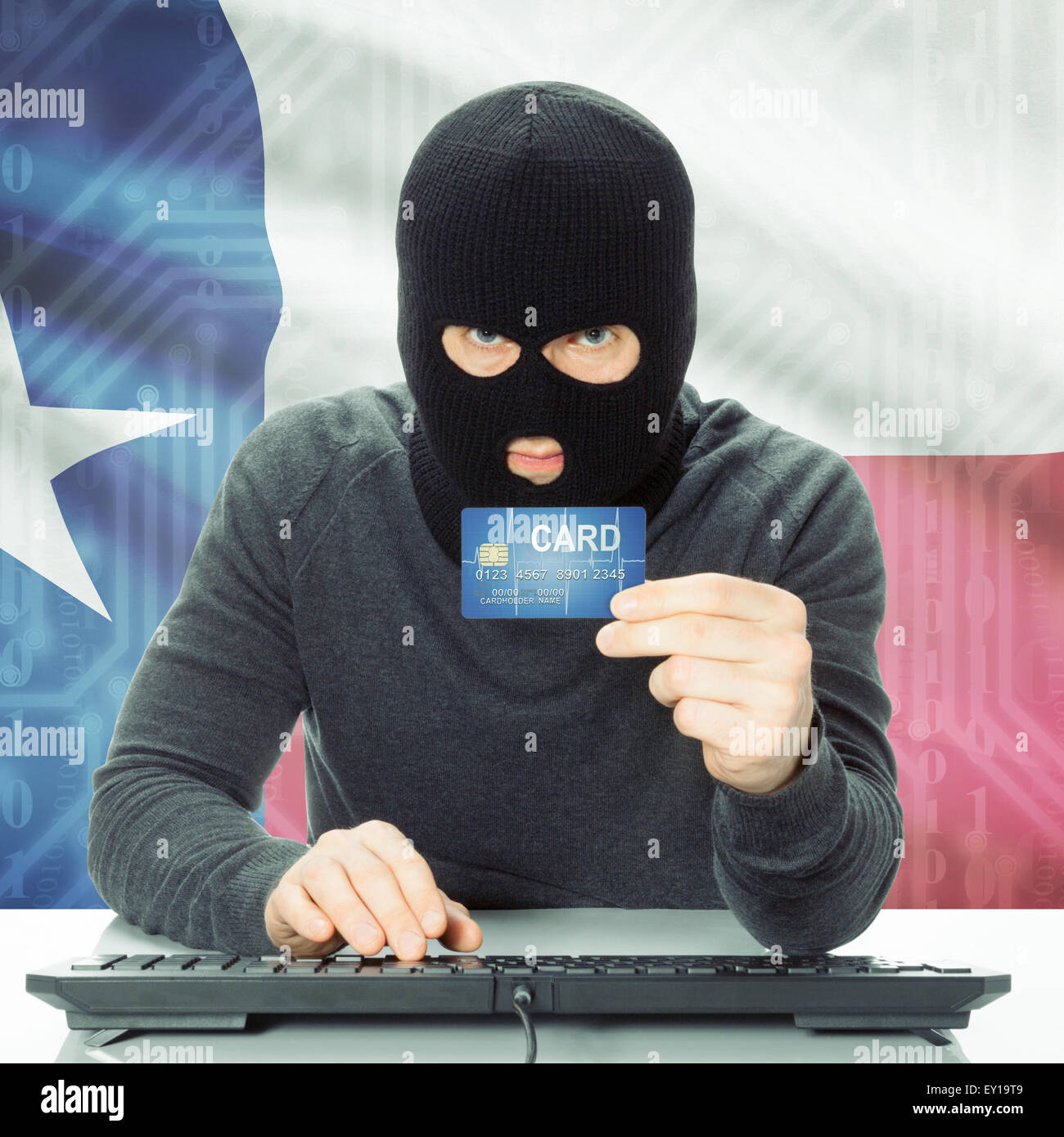 Masked hacker stealing online information hi-res stock photography and ...
