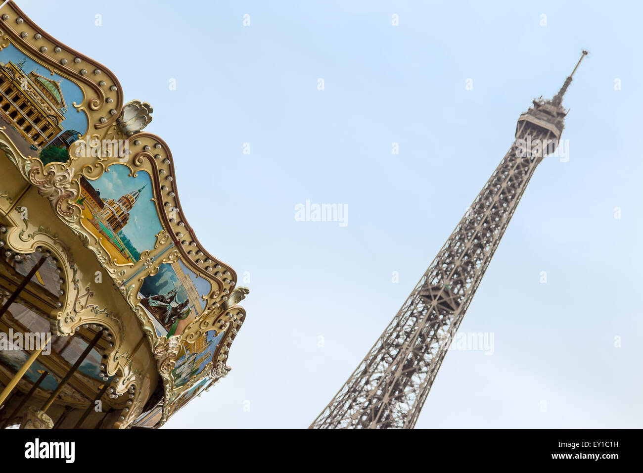 rotating carousel with background Eiffel Tower Stock Photo - Alamy