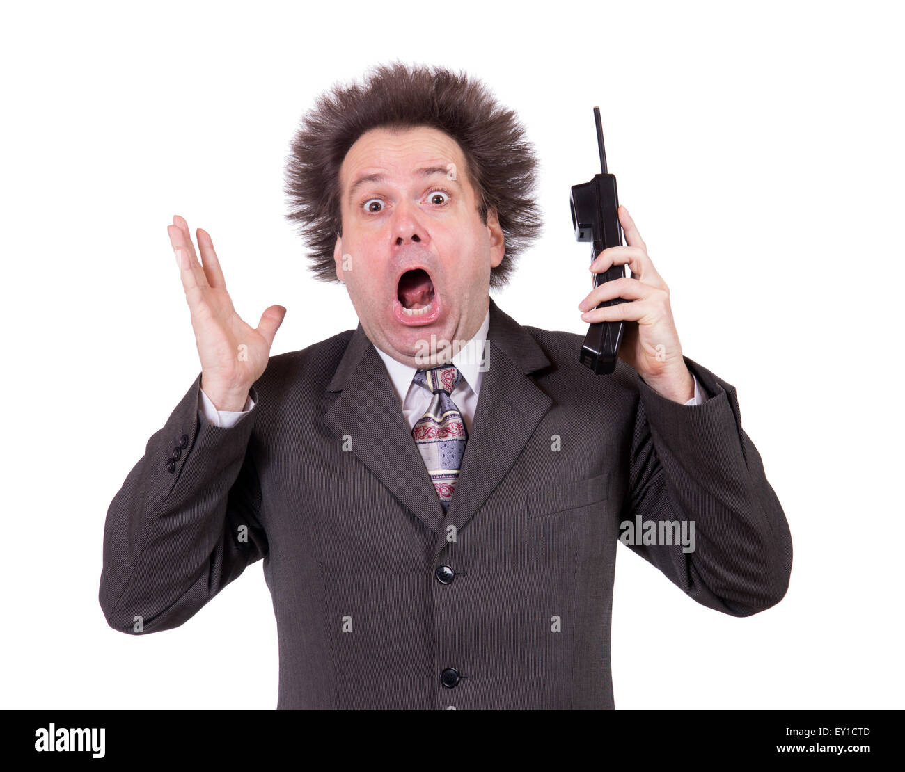 Shocked man with phone Stock Photo - Alamy