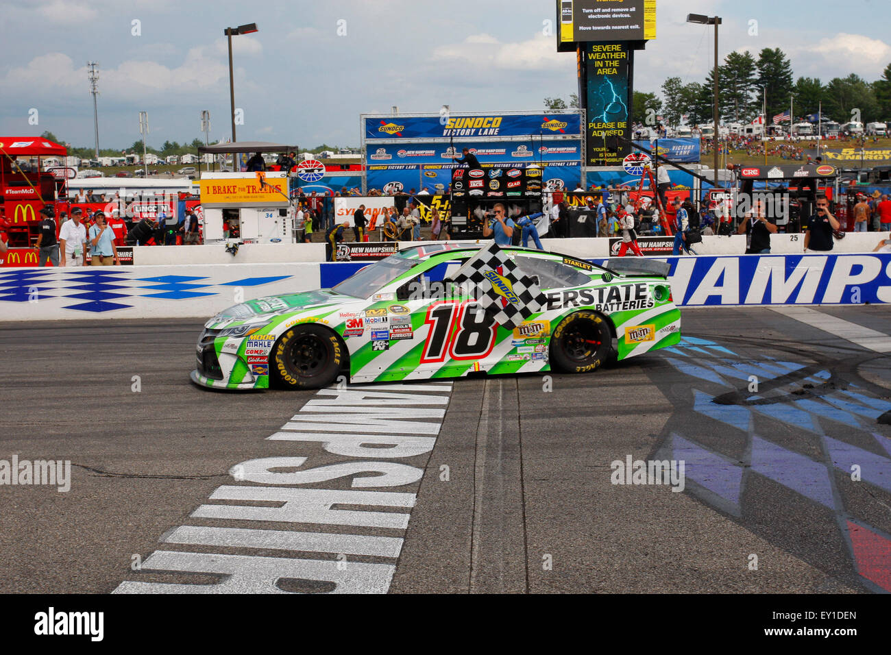 Loudon, NH, USA. 19th July, 2015. Kyle Busch (18) wins the 5-hour ...