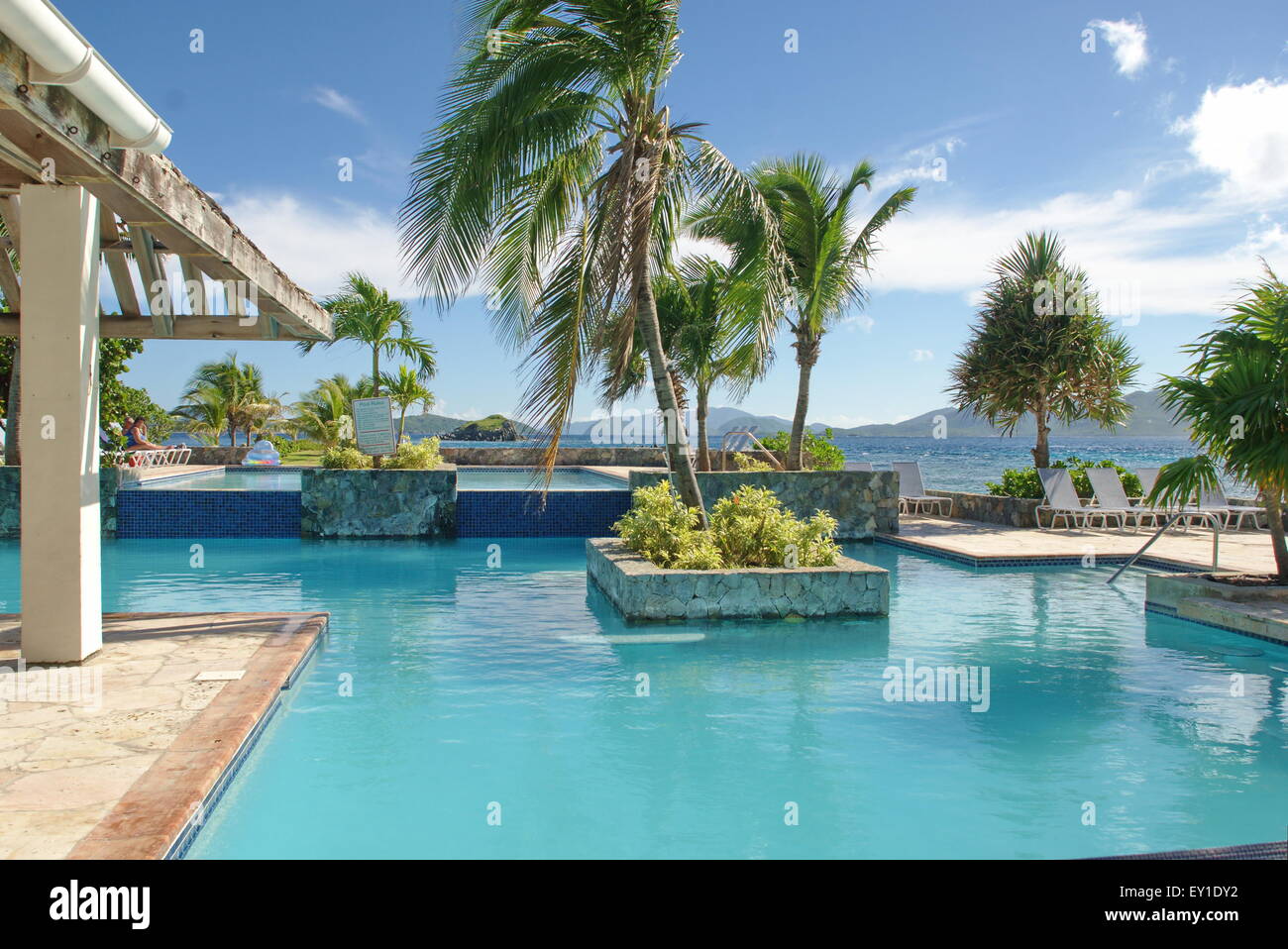 Resort swimming pool on the Caribbean sea on the island of St. Thomas ...