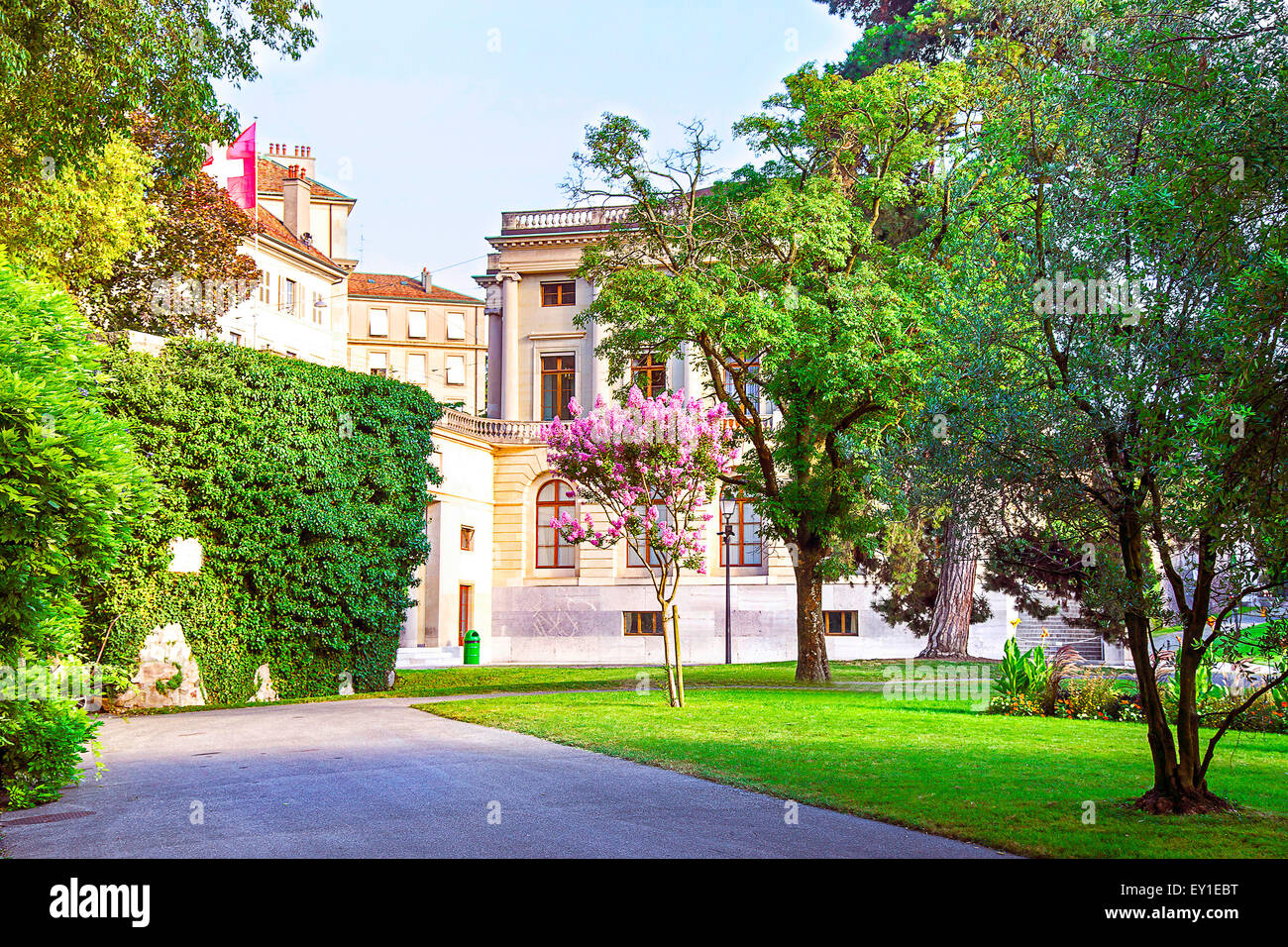 Geneva street view with trees in summertime Stock Photo - Alamy