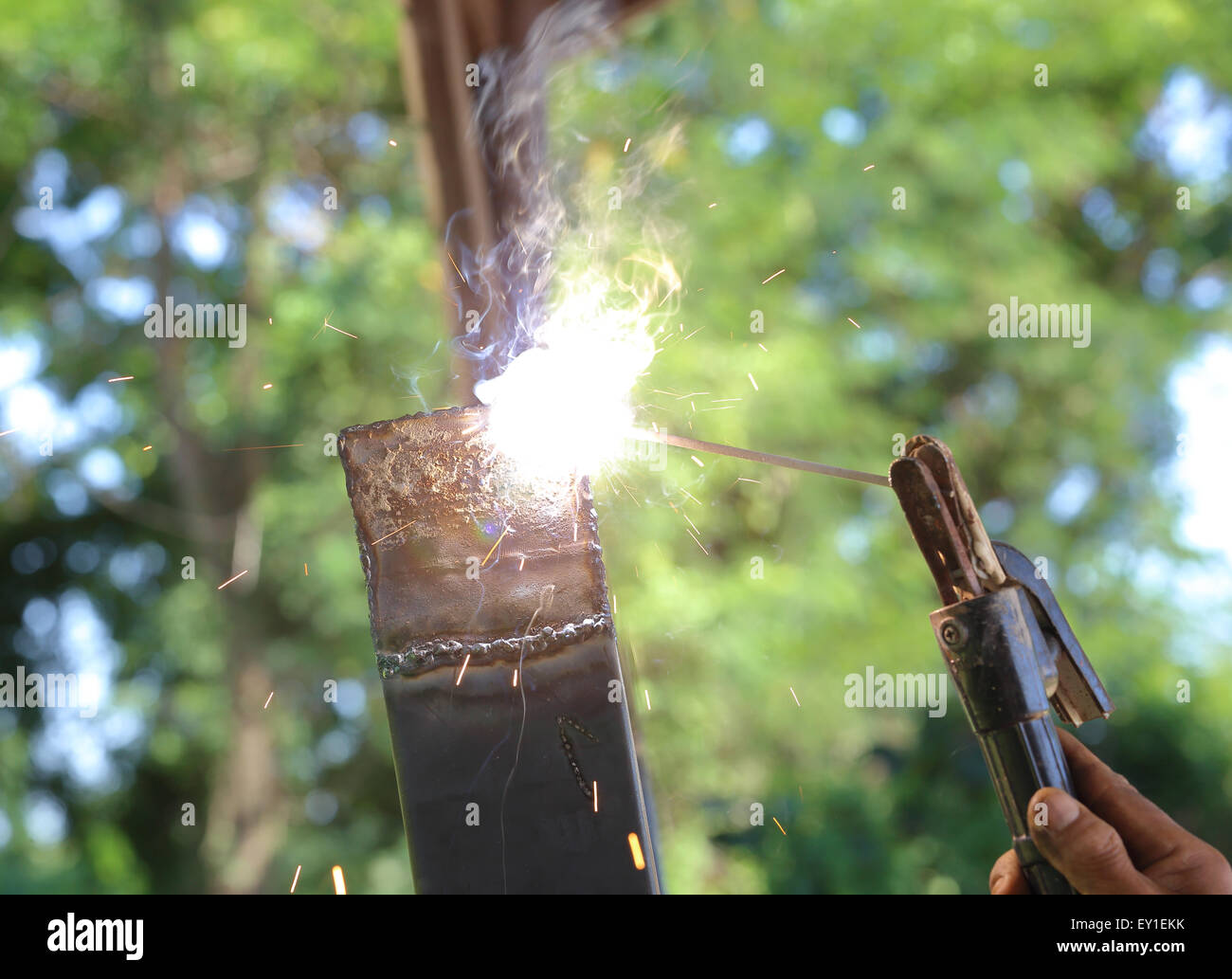 close up hand of worker welding metal Stock Photo - Alamy