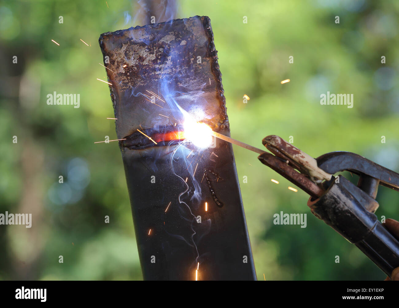 close up hand of worker welding metal Stock Photo - Alamy