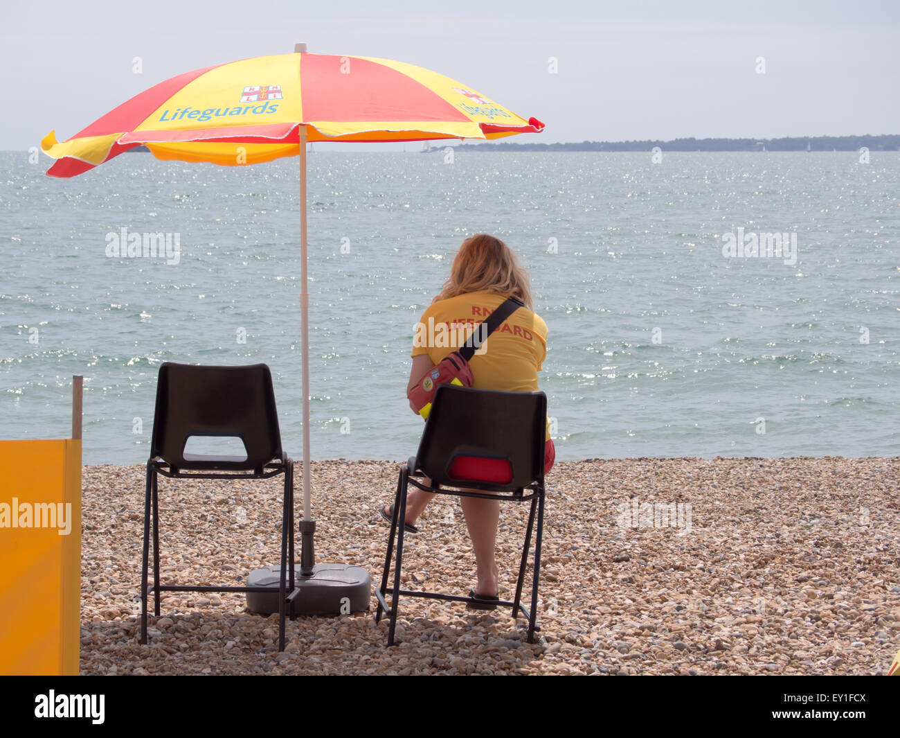 Lifeguard sitting on lifeguard chair hi-res stock photography and ...