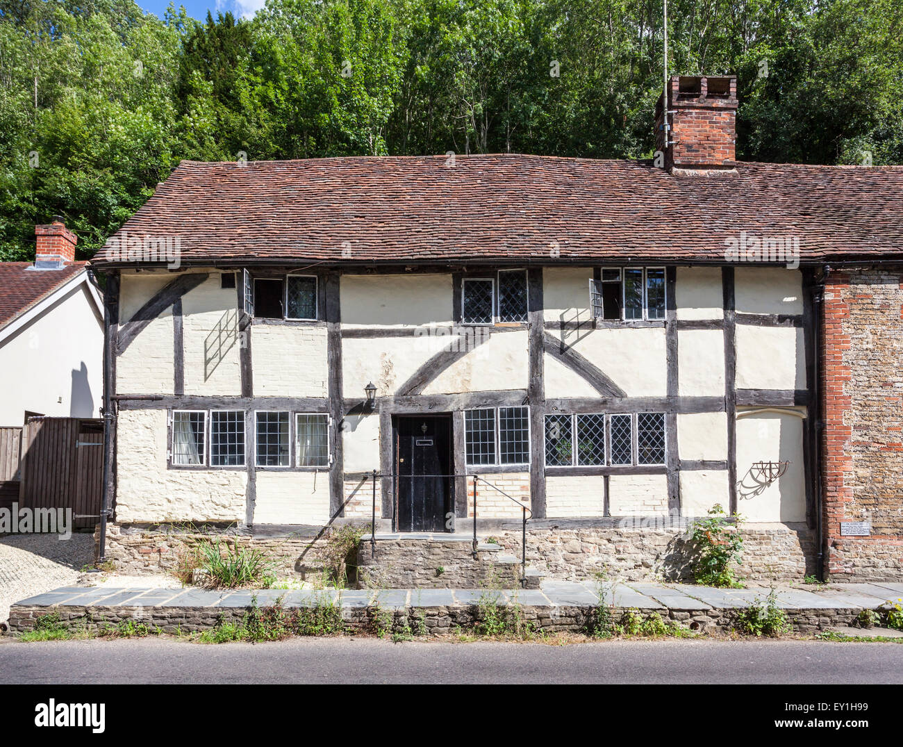 Front view of old historic black and white timbered cottage in Eashing ...