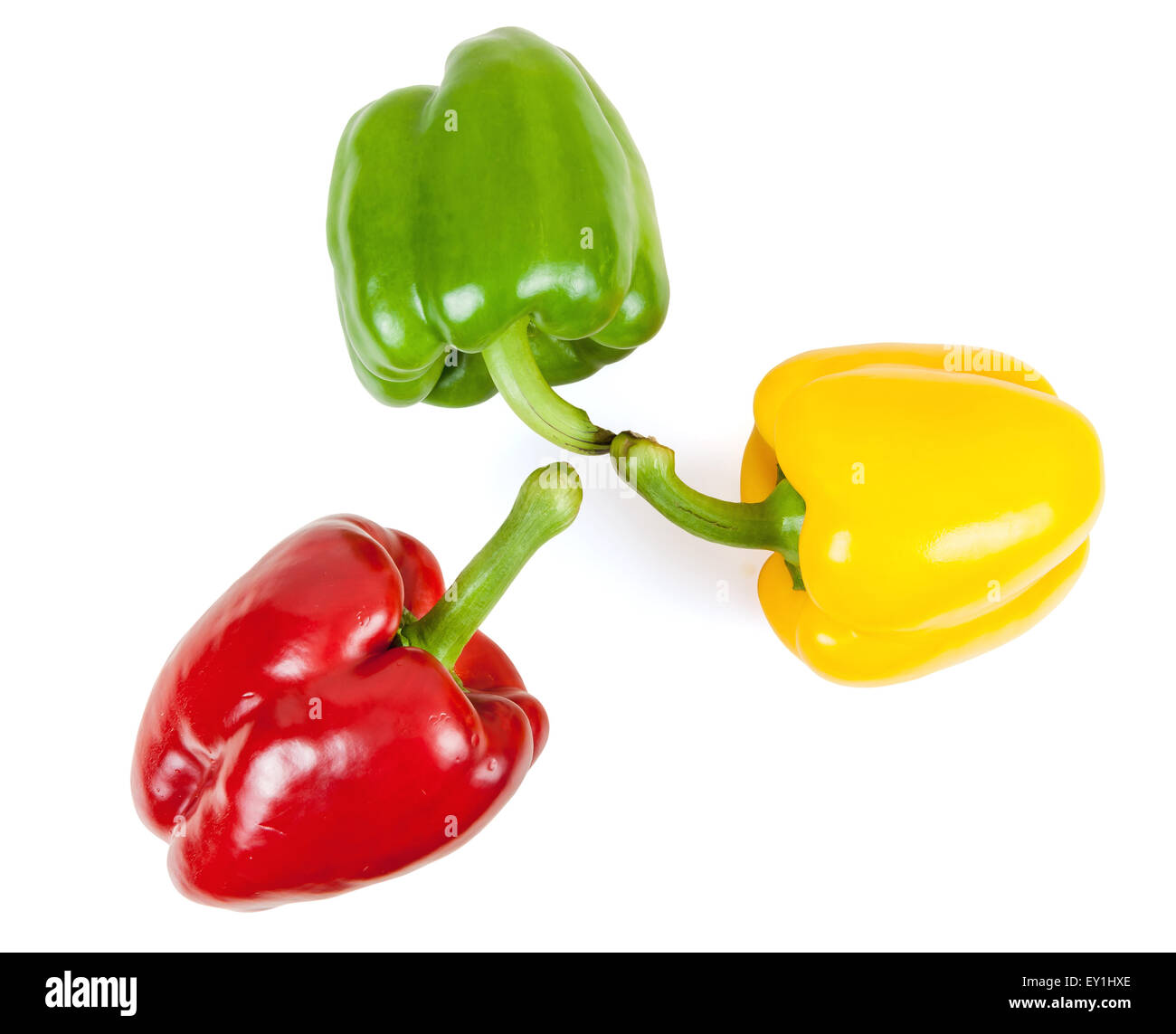Three colored peppers isolated on white background with clipping path ...
