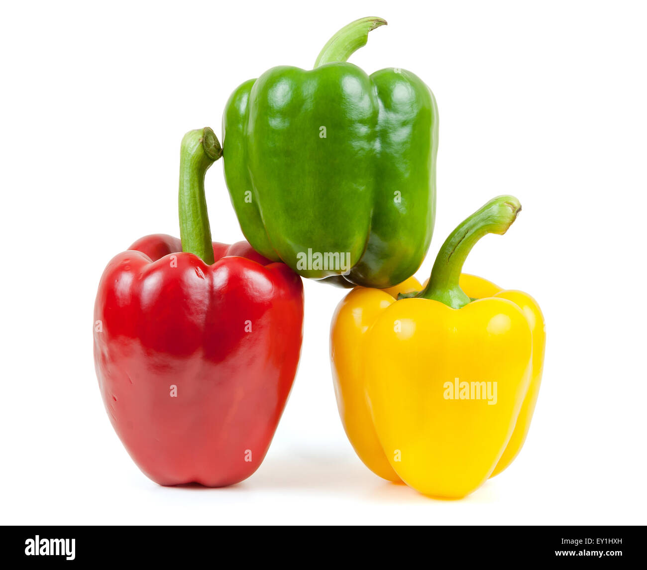 Three colored peppers isolated on white background with clipping path ...