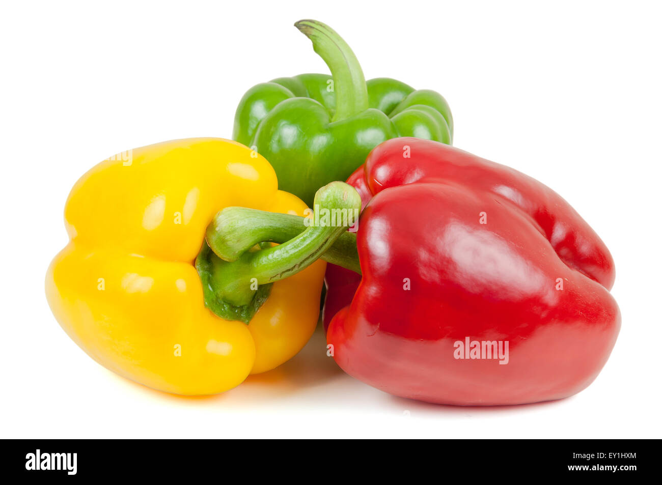 Three colored peppers isolated on white background with clipping path ...