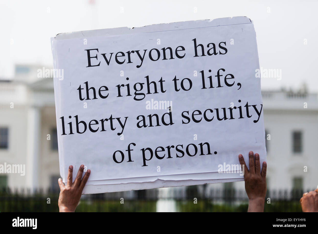 Man in front of sign hi-res stock photography and images - Alamy