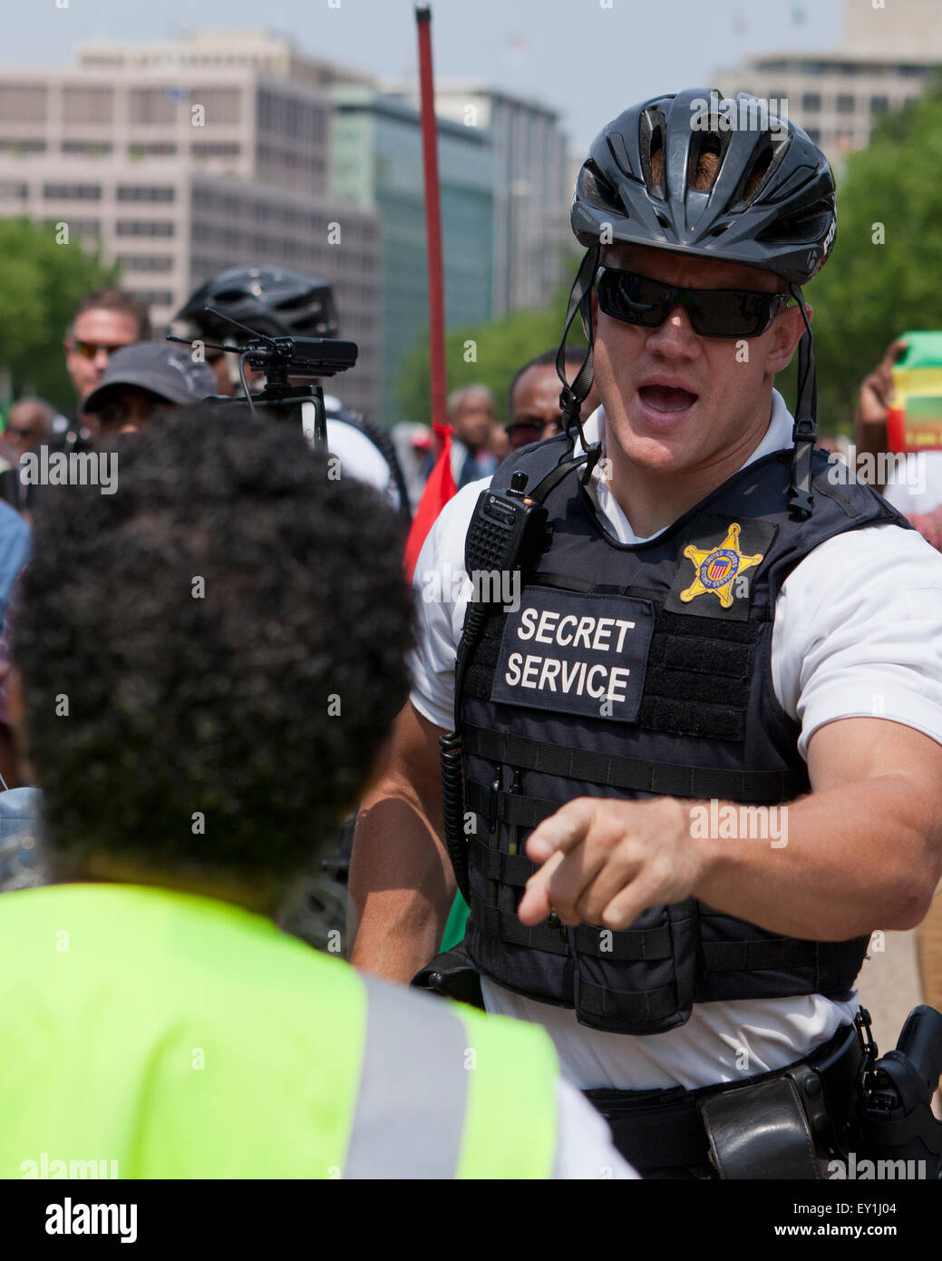 Secret Service policeman performing crowd control during protest ...