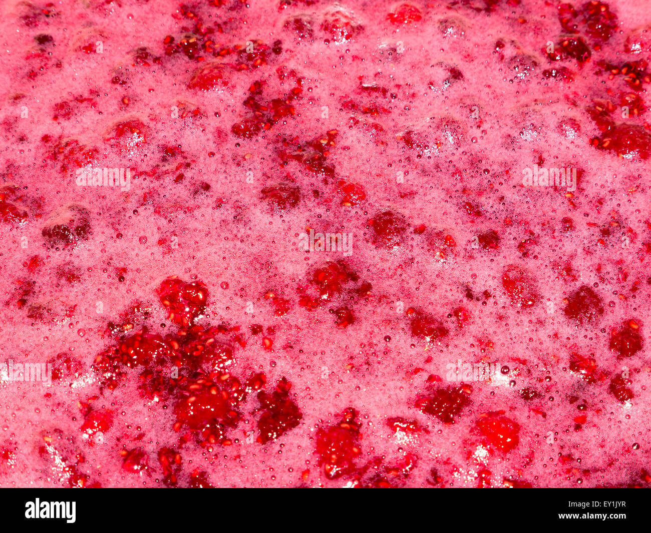 The Jam raspberry background and texture Stock Photo - Alamy