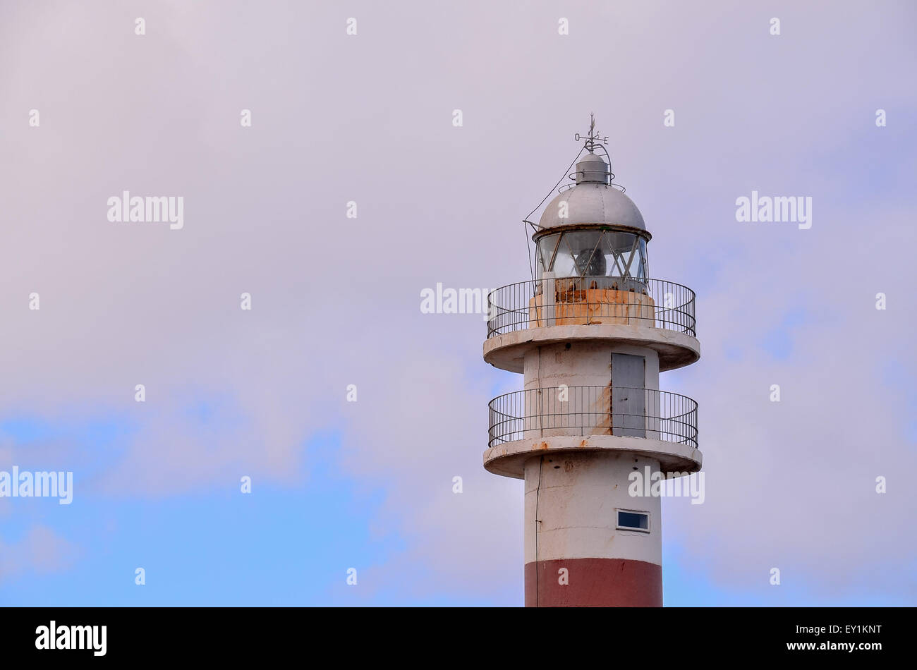 High Lighthouse near the Coast Stock Photo - Alamy