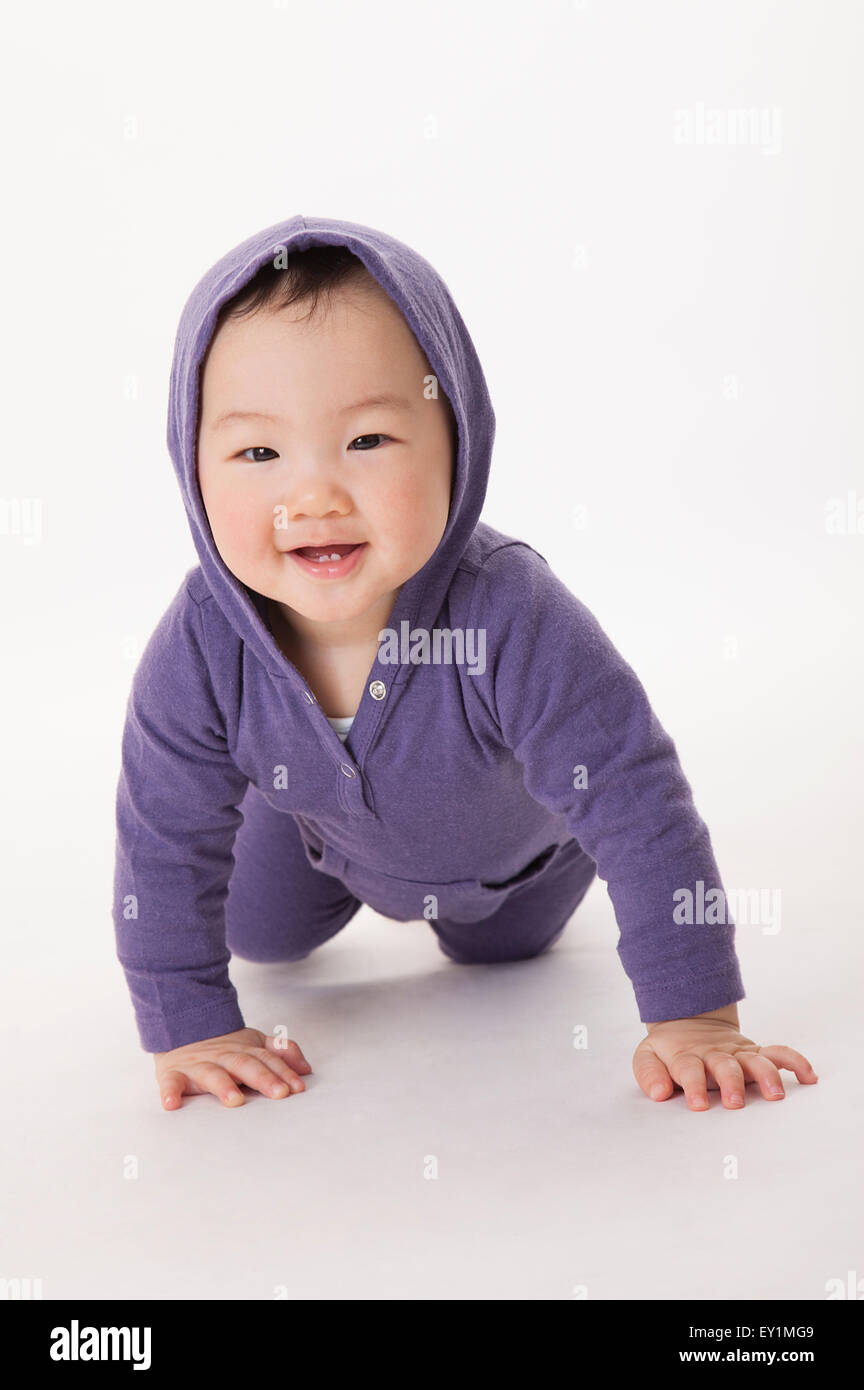 Baby boy smiling at the camera Stock Photo - Alamy