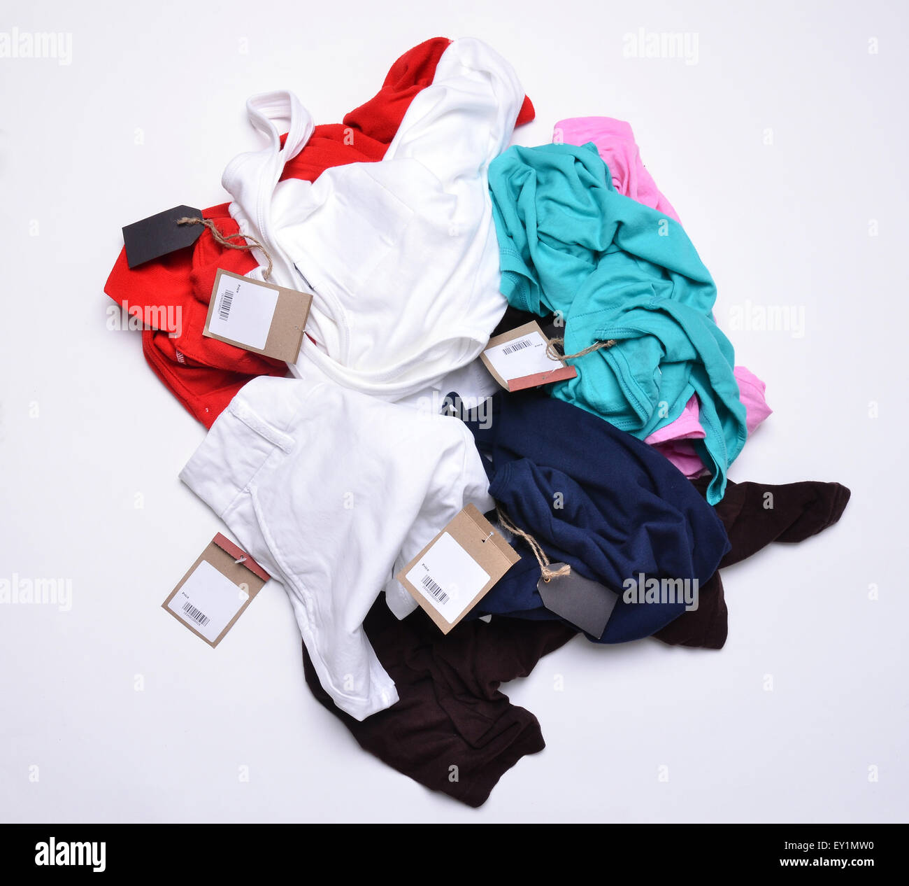 shirt with price tag on white background Stock Photo - Alamy