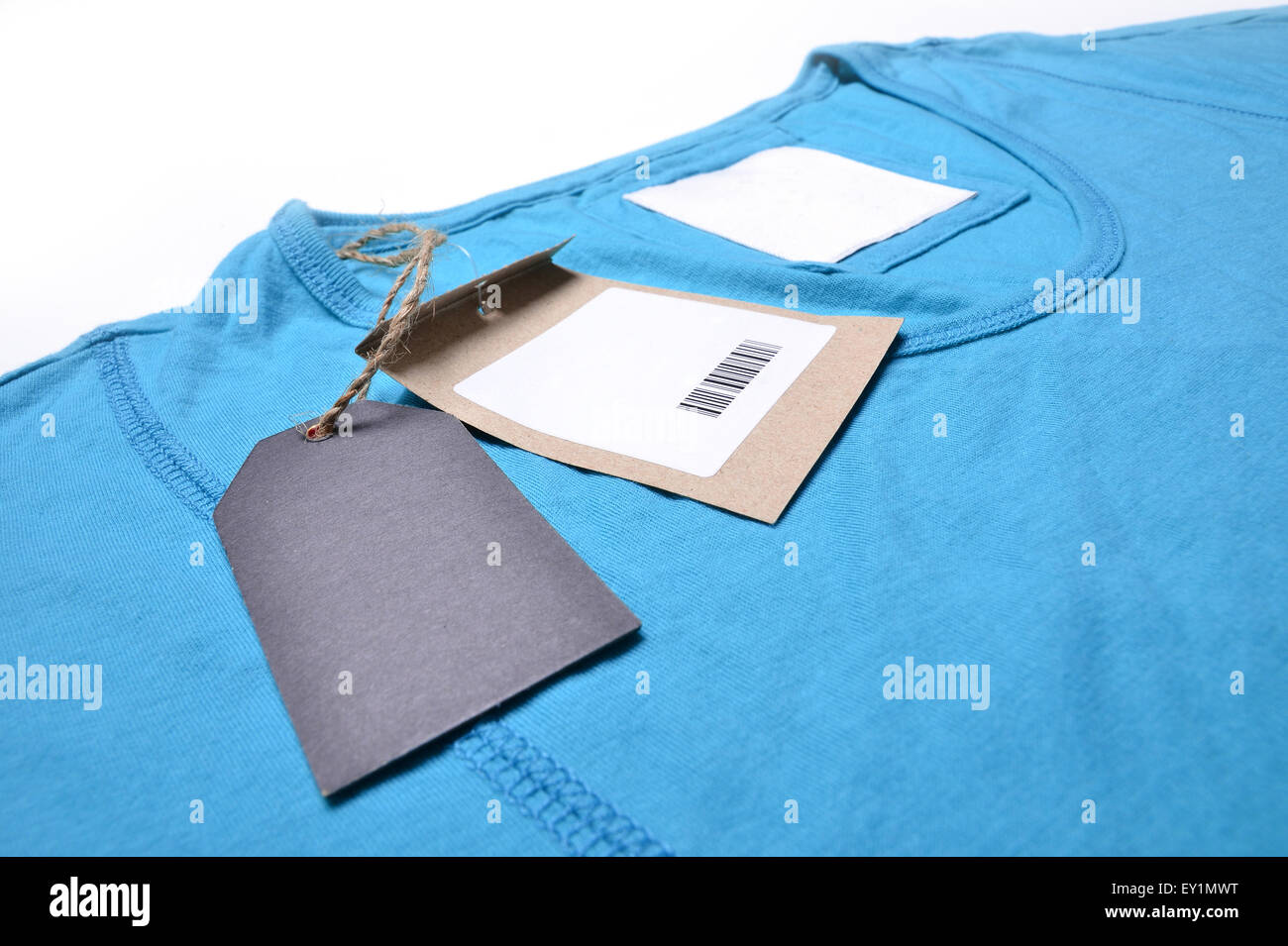 shirt with price tag on white background Stock Photo - Alamy