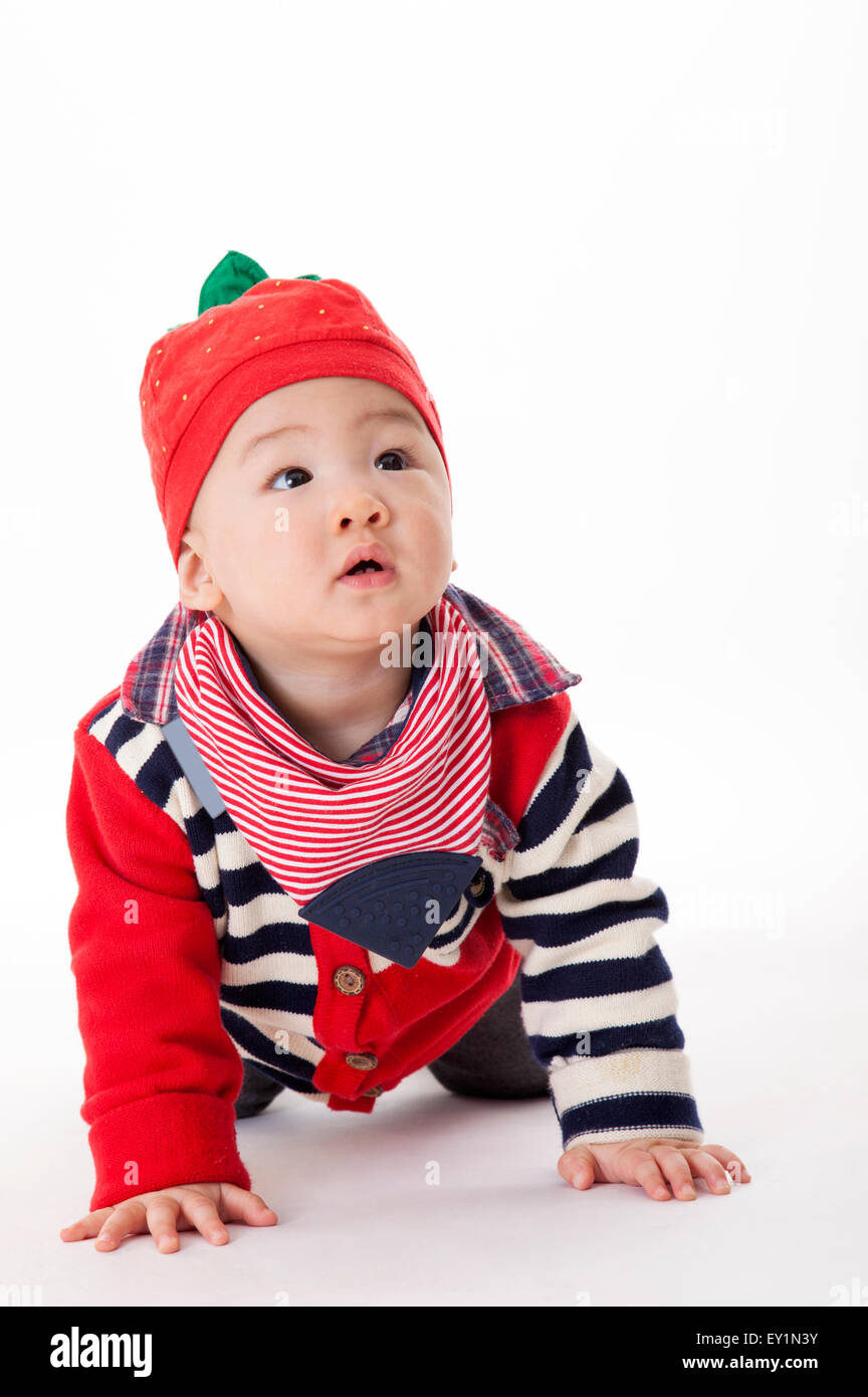 Baby boy looking up Stock Photo - Alamy