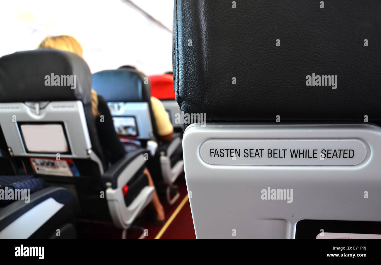 Seat belt plane hi-res stock photography and images - Alamy