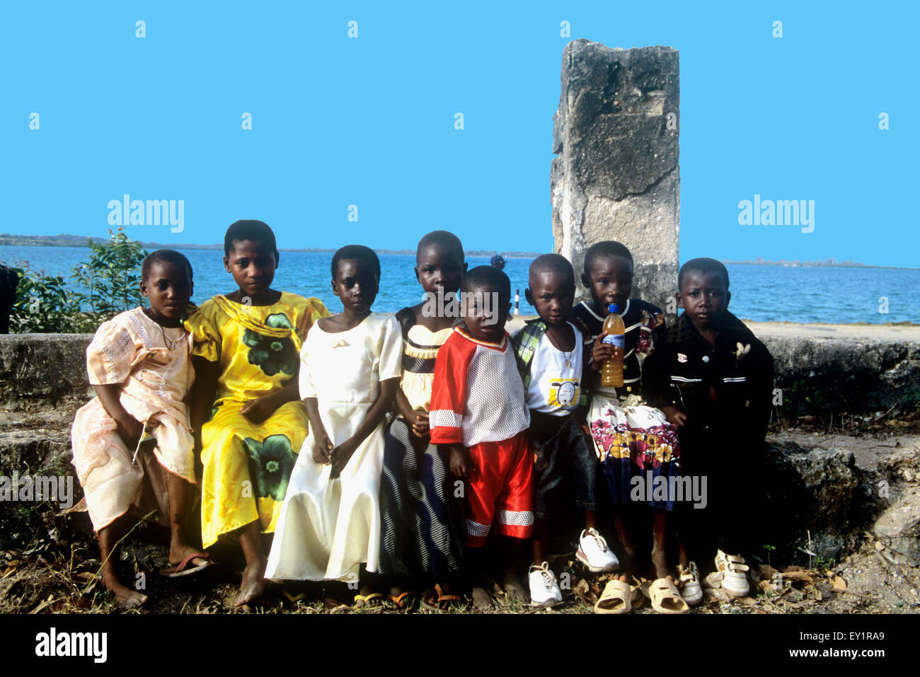 African children dressed in new clothes for the Muslim celebration of ...