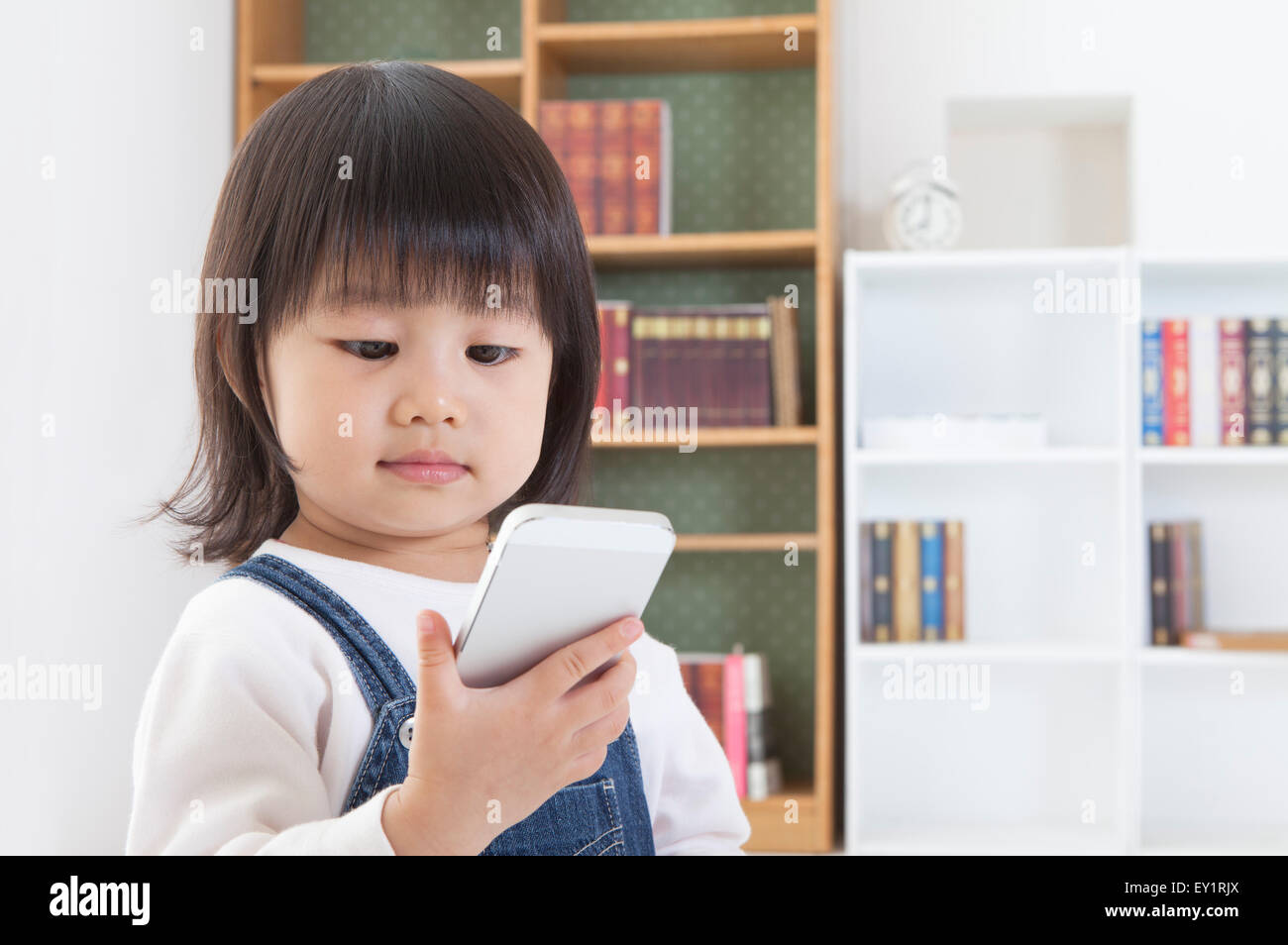 Child phone studio thinking hi-res stock photography and images - Alamy