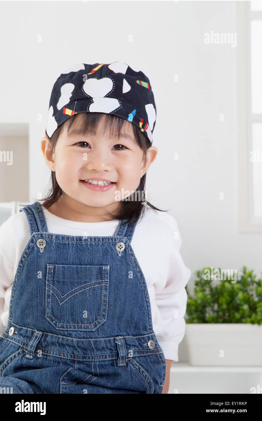 Little girl smiling at the camera Stock Photo - Alamy