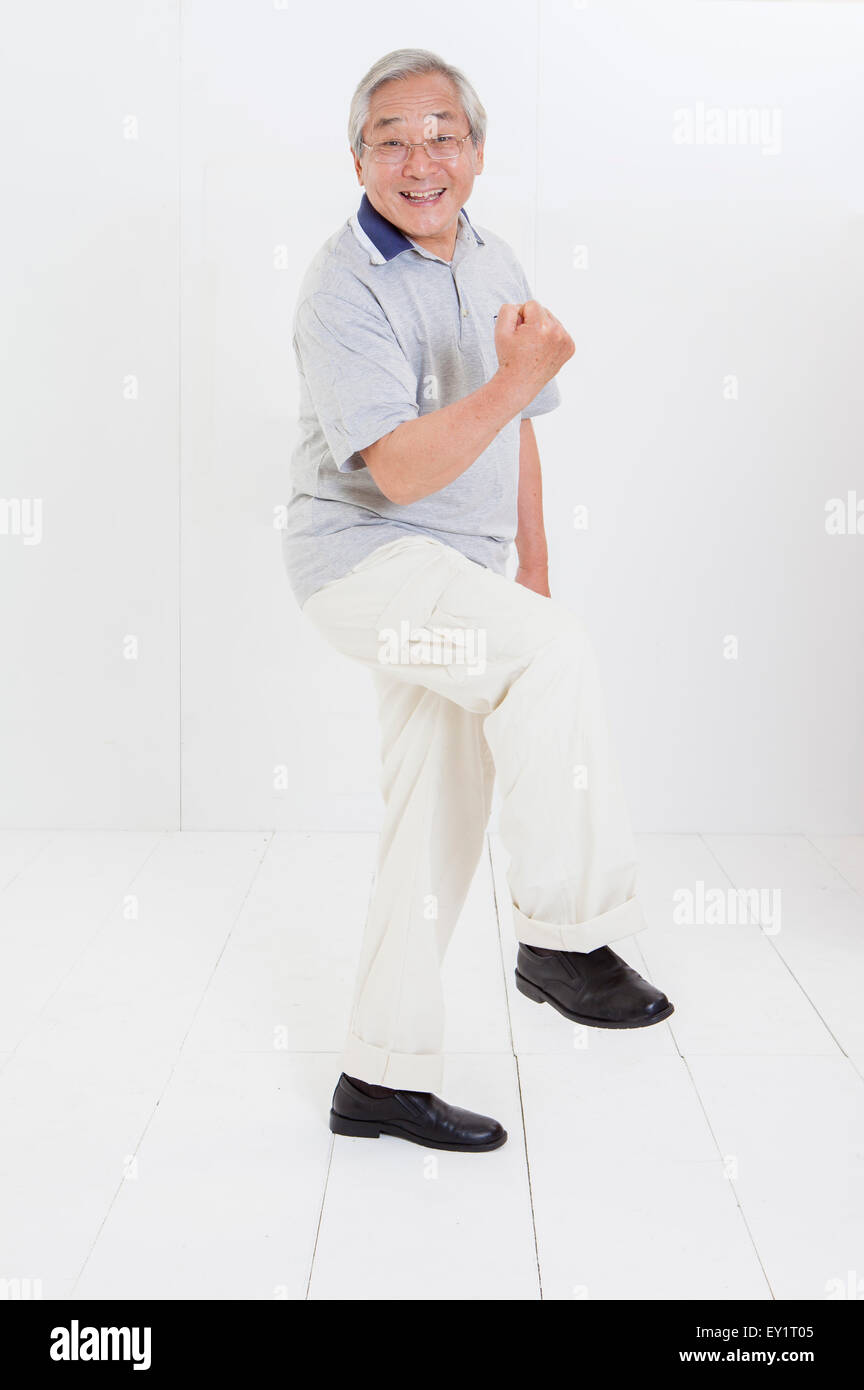 Man standing on one leg hi-res stock photography and images - Alamy