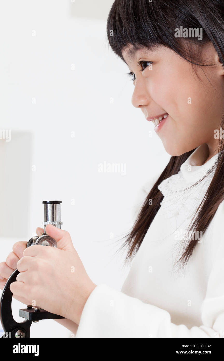Microscope looking into hi-res stock photography and images - Alamy