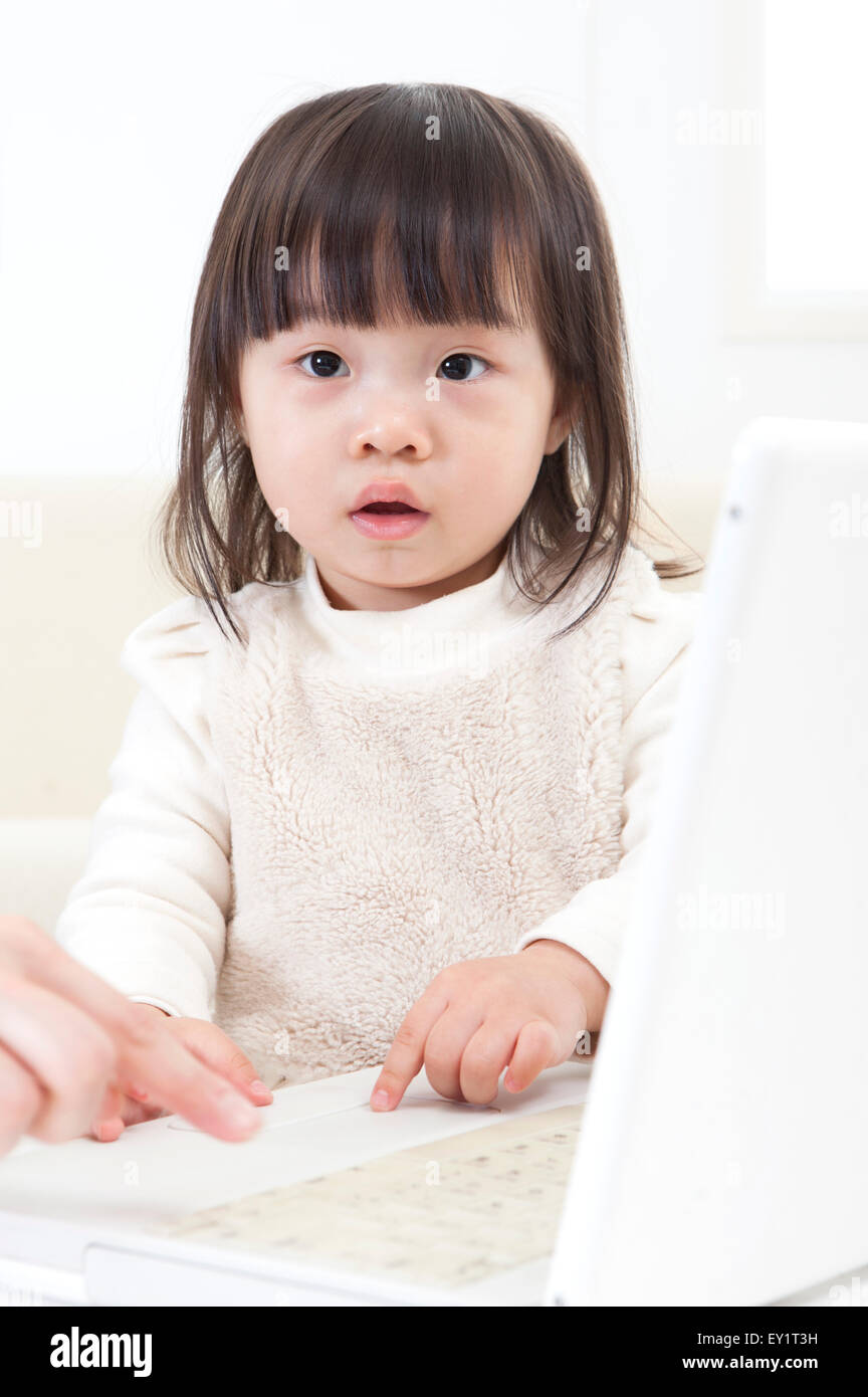 Girl with laptop hi-res stock photography and images - Alamy