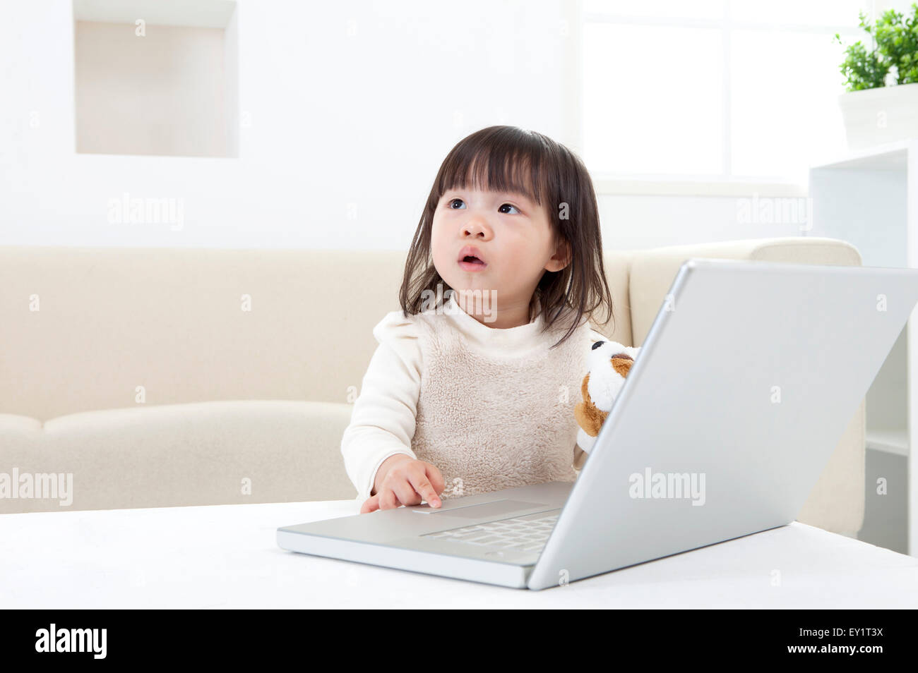 Baby girl touching hi-res stock photography and images - Alamy