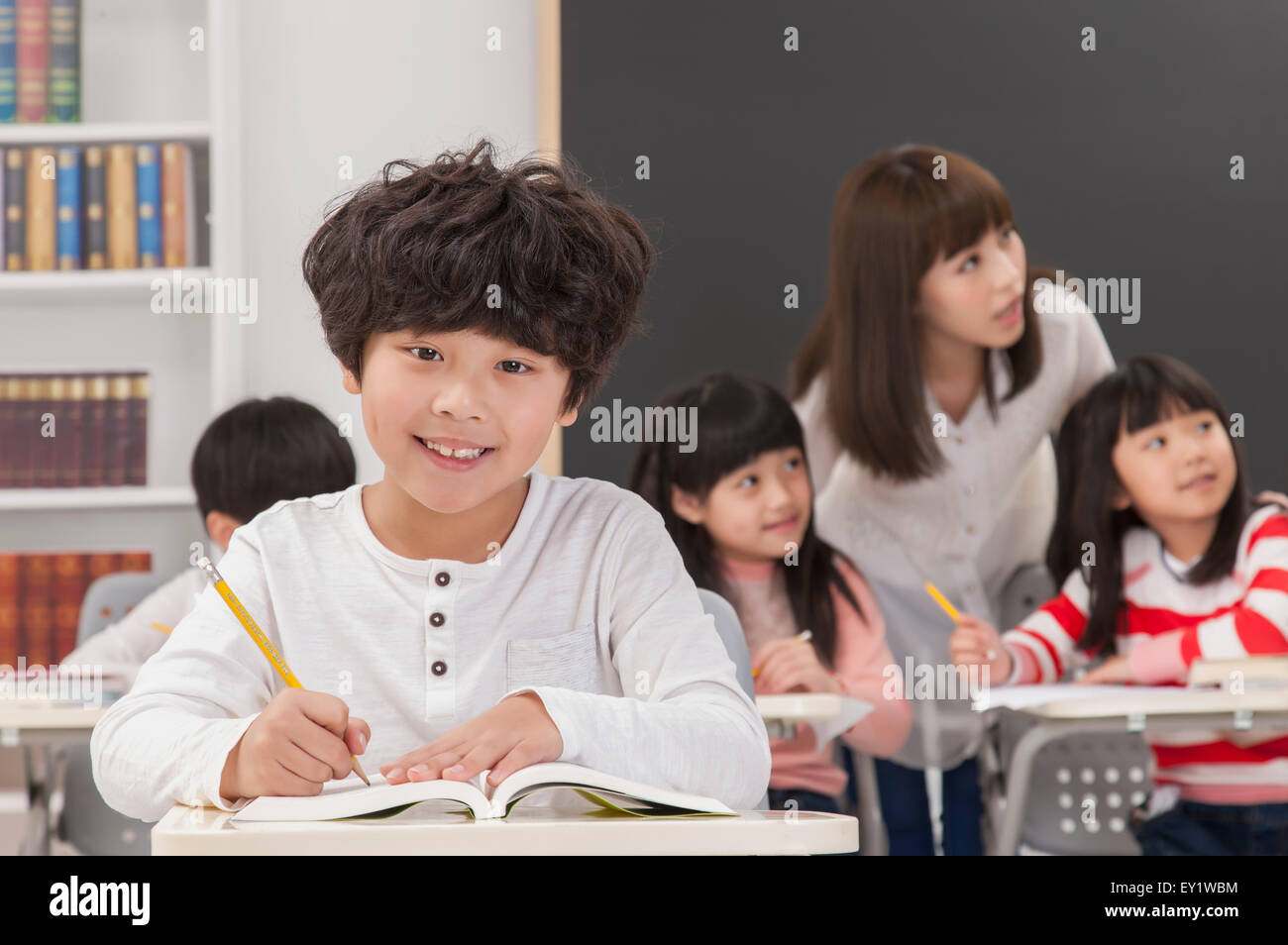 Schoolwork hi-res stock photography and images - Alamy