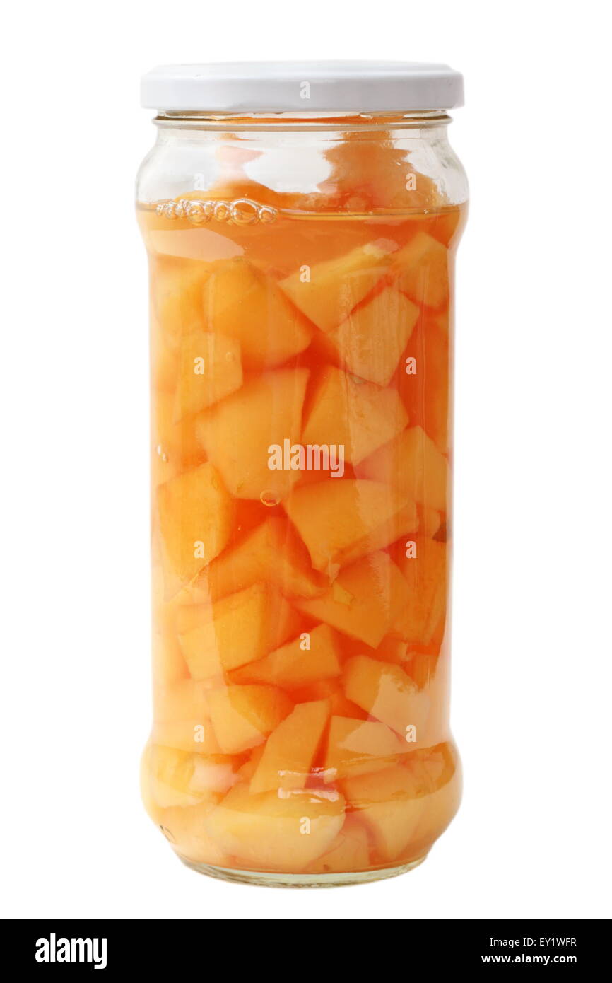 stewed fruits in a jar with cap isolated on white background - quince ...