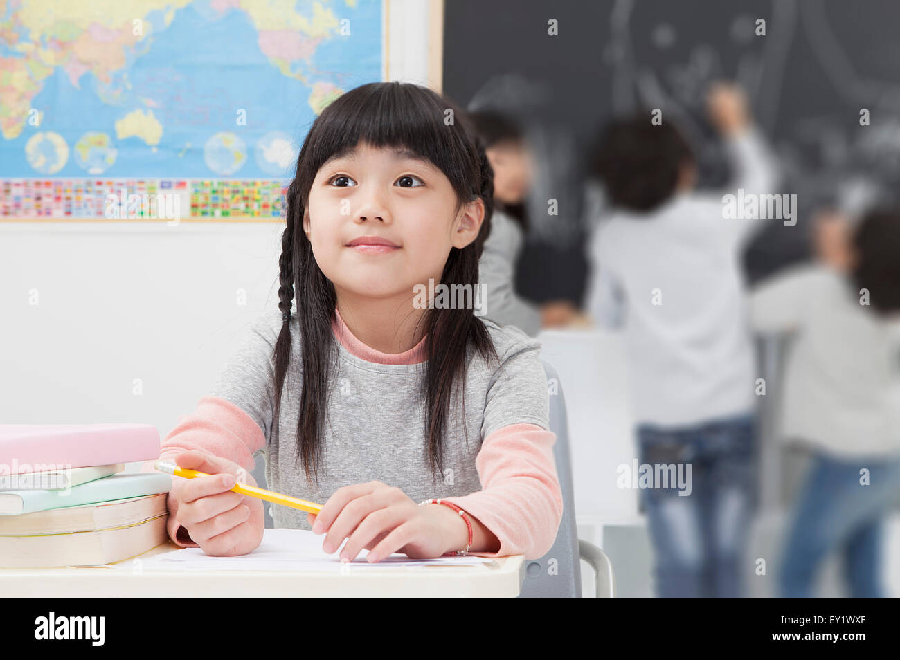 Children studying in the classroom together Stock Photo - Alamy