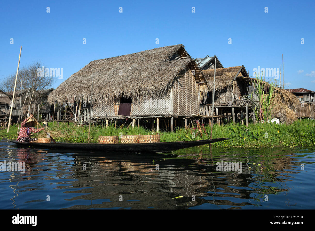 Traditional thatched roof stilt house hi-res stock photography and ...