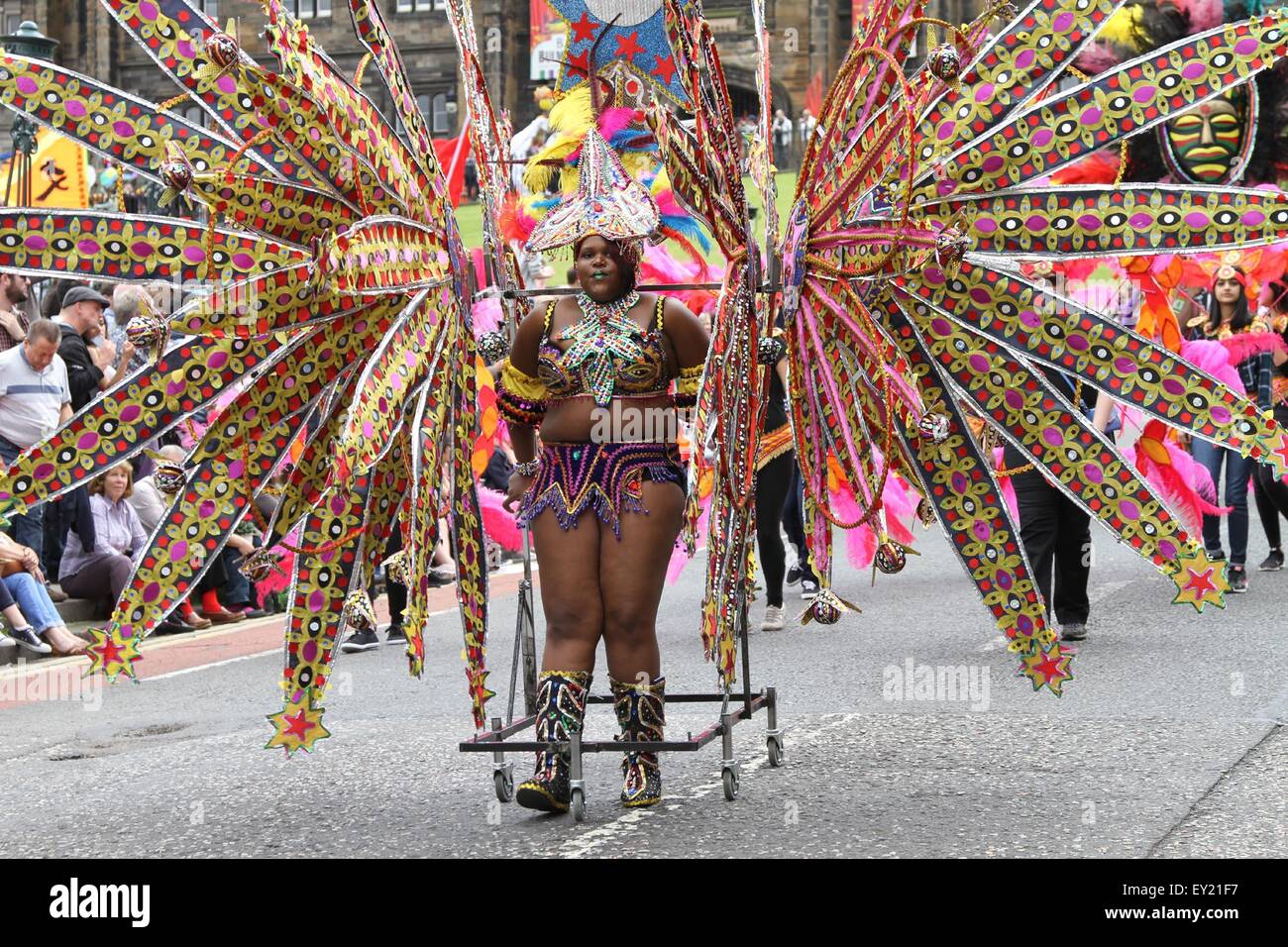 Edinburgh, Britain. 19th July, 2015. A performer attends the grand ...
